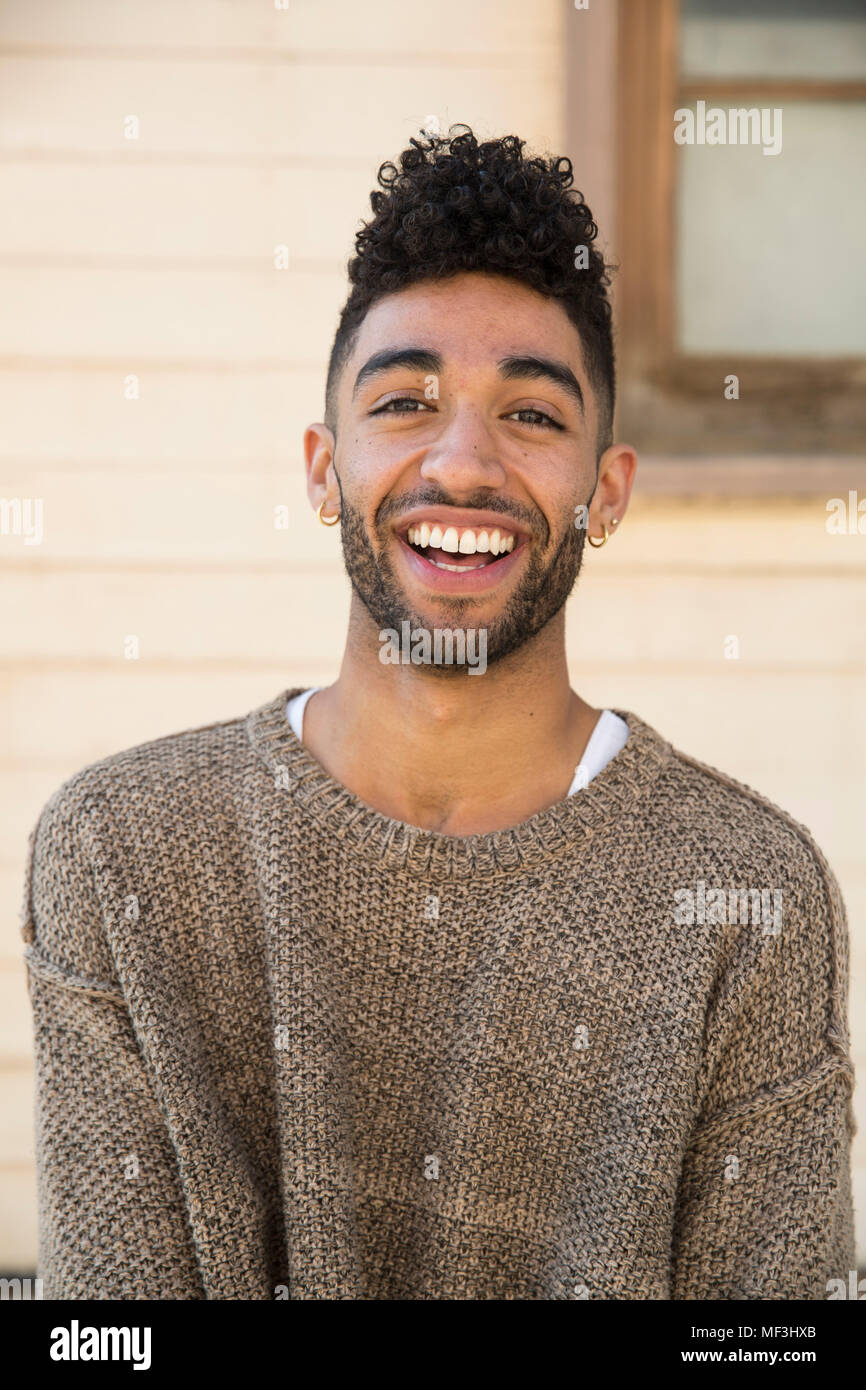 Happy young black man portrait hi-res stock photography and images - Alamy