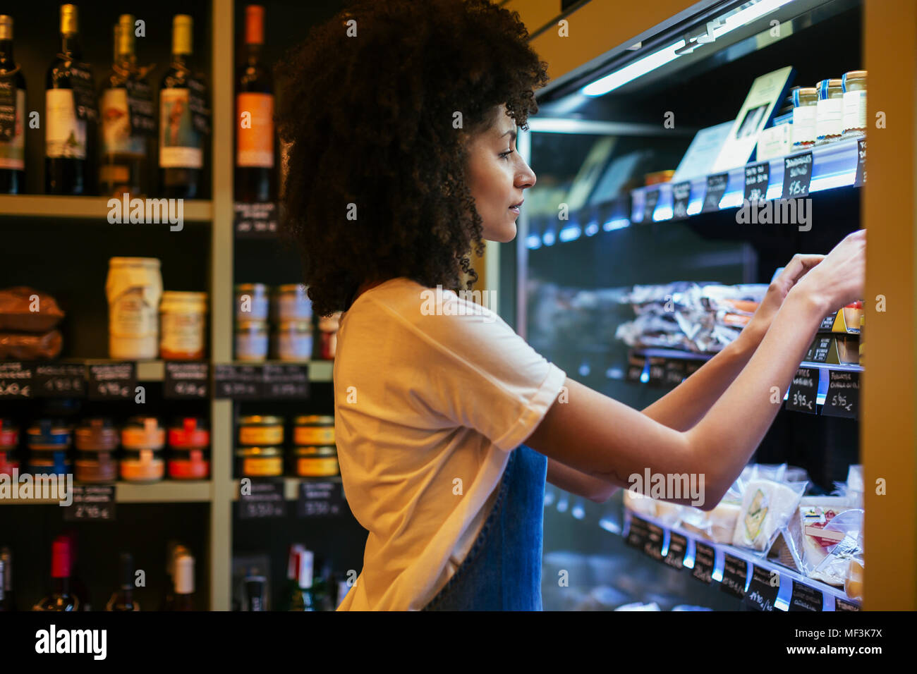 Woman product shelf hi-res stock photography and images - Alamy