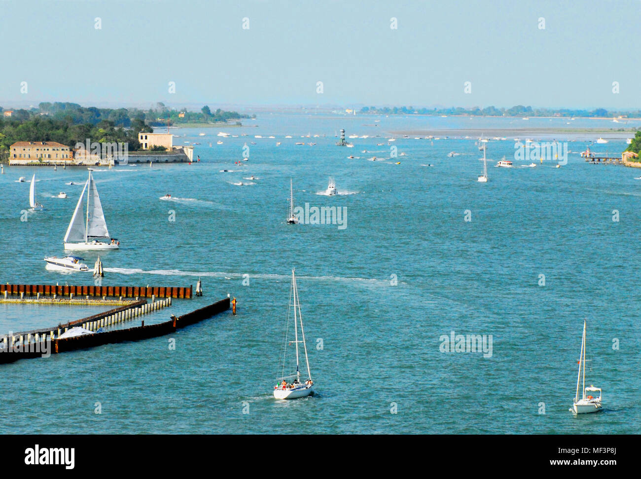 A panoramic overview-from a cruise ship- of boating fun near Venice ...