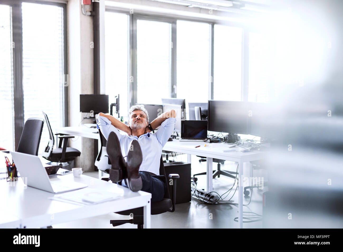 Back Of Man Seated Desk High Resolution Stock Photography and Images ...