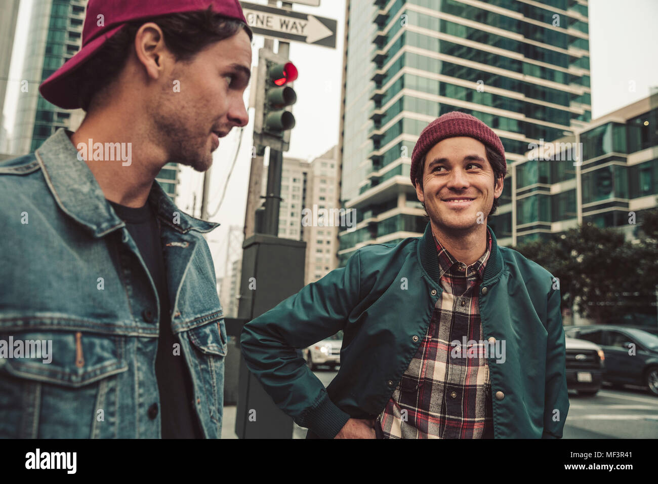 Two young men in the city on the move Stock Photo - Alamy