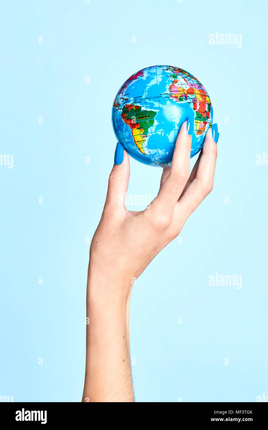 Hands holding globe hi-res stock photography and images - Alamy