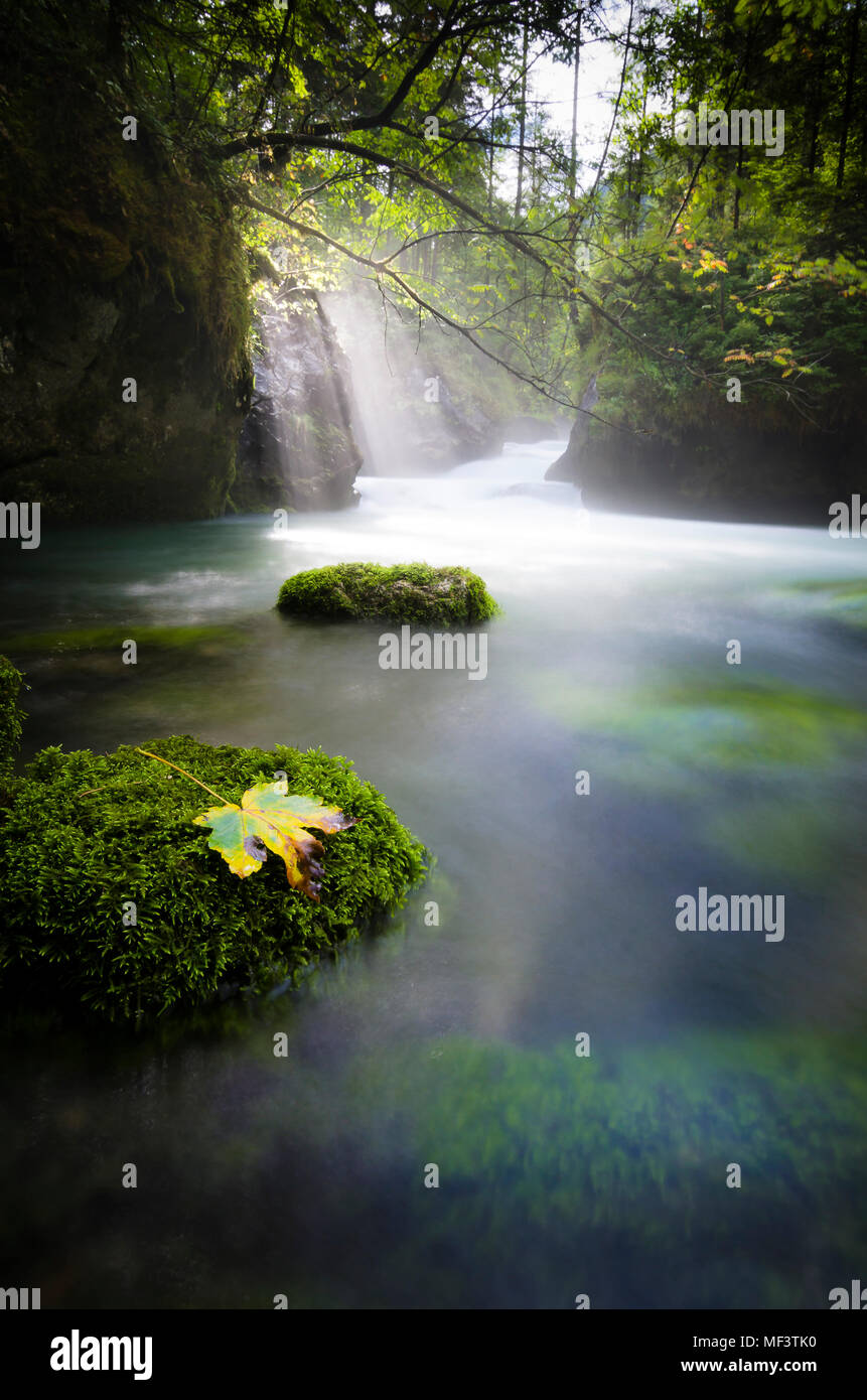 Austria, Hallstatt, natural brook, waterfall, sunlight Stock Photo - Alamy