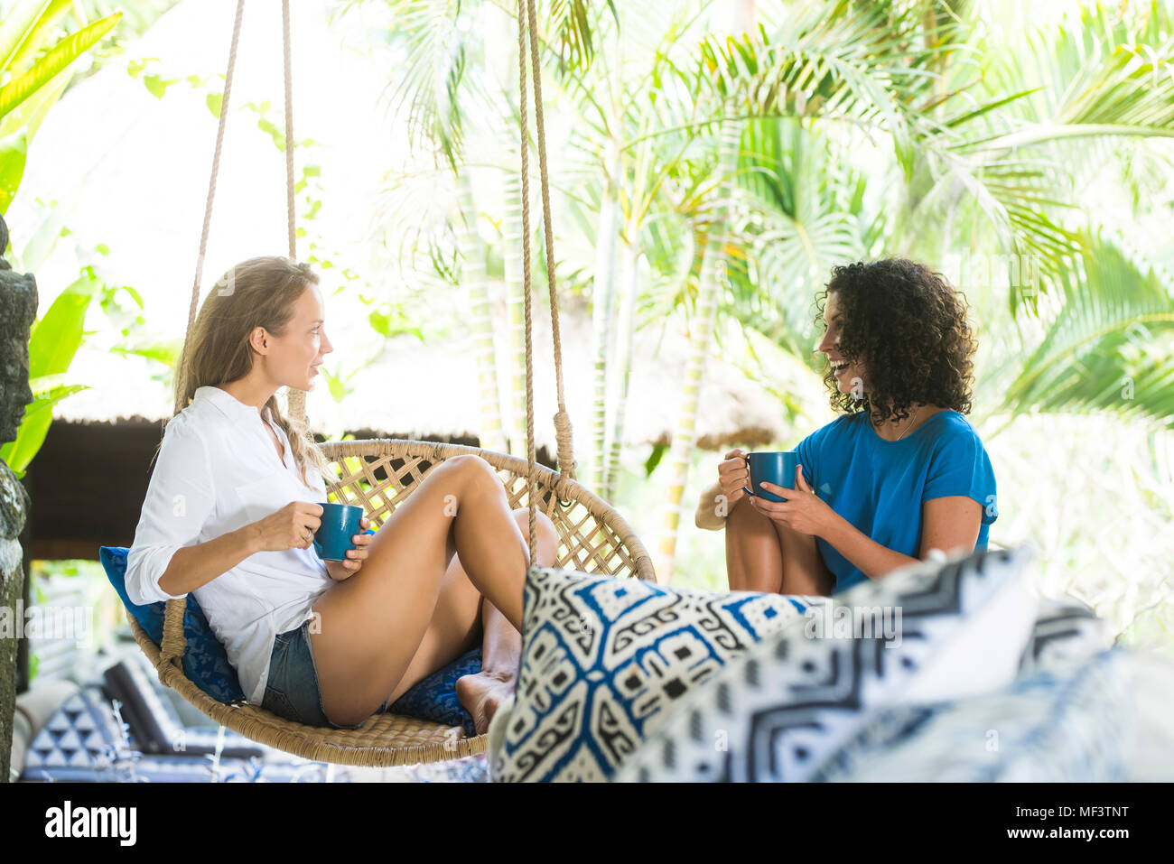 Two female friends having coffee hi-res stock photography and images ...