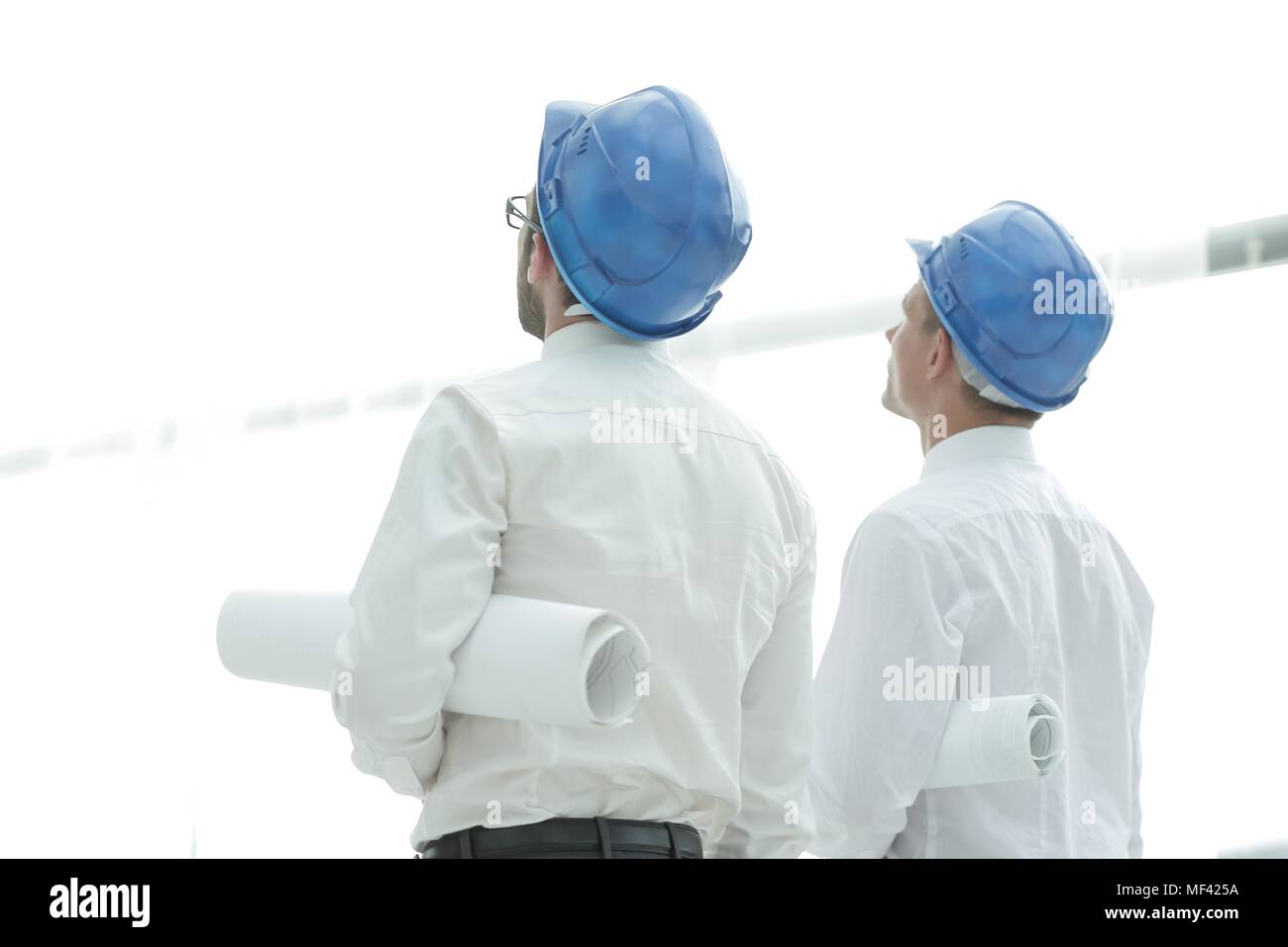 rear view. architect and Builder Stock Photo - Alamy