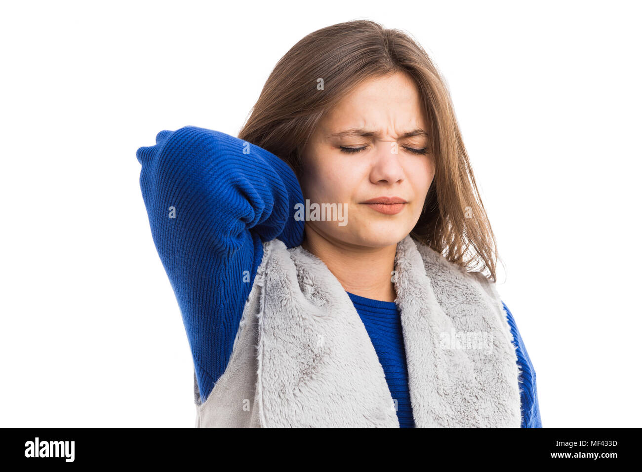 Young woman suffering strong neck pain ache as stress tension or ...