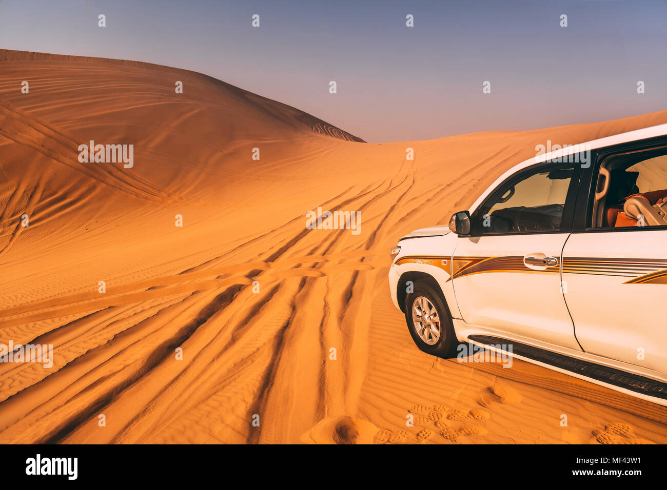 Dune bashing with a 4x4 jeep in the desert of Al Khatim in Abu Dhabi ...