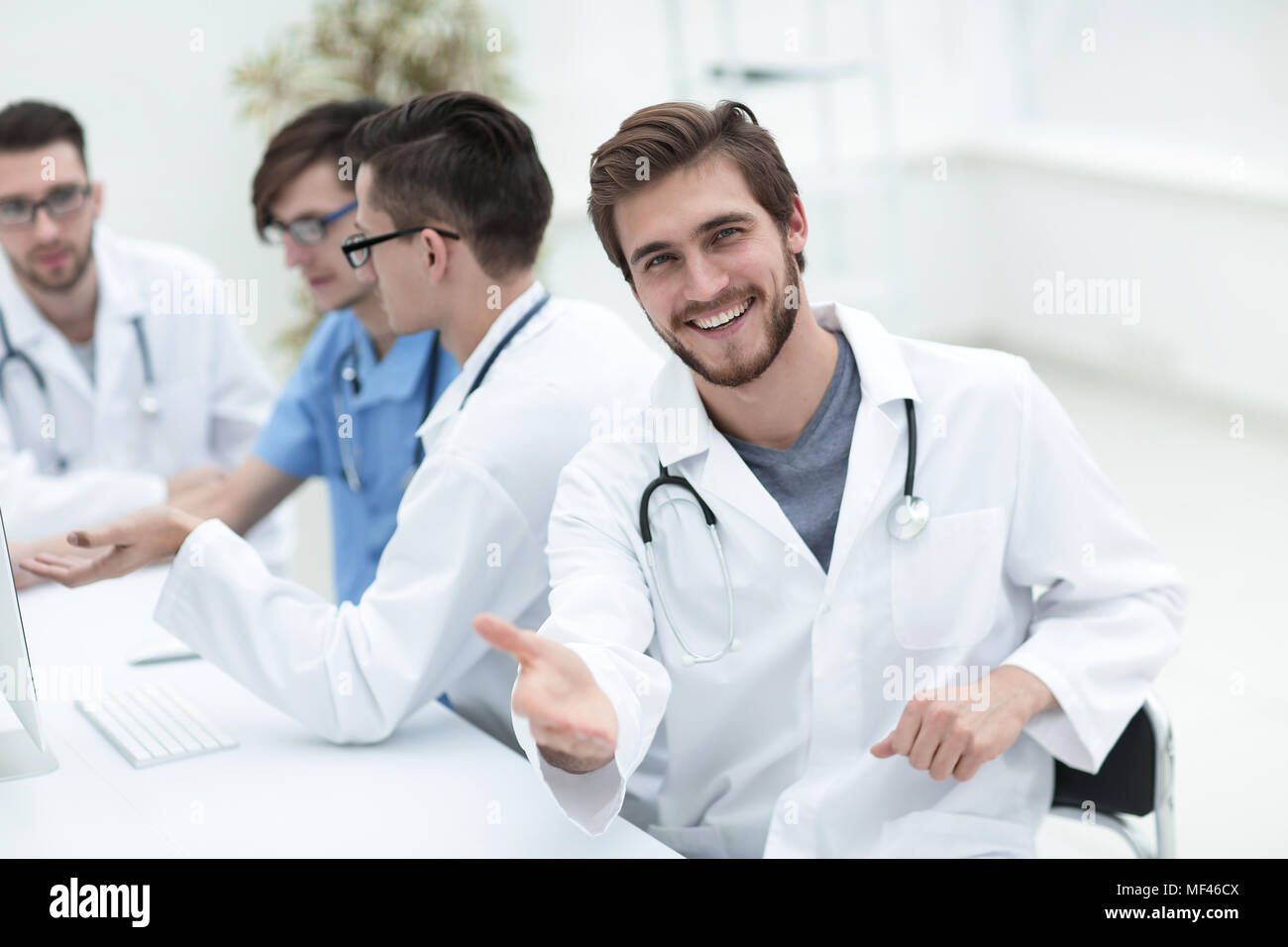 Doctor welcome gesture hi-res stock photography and images - Alamy