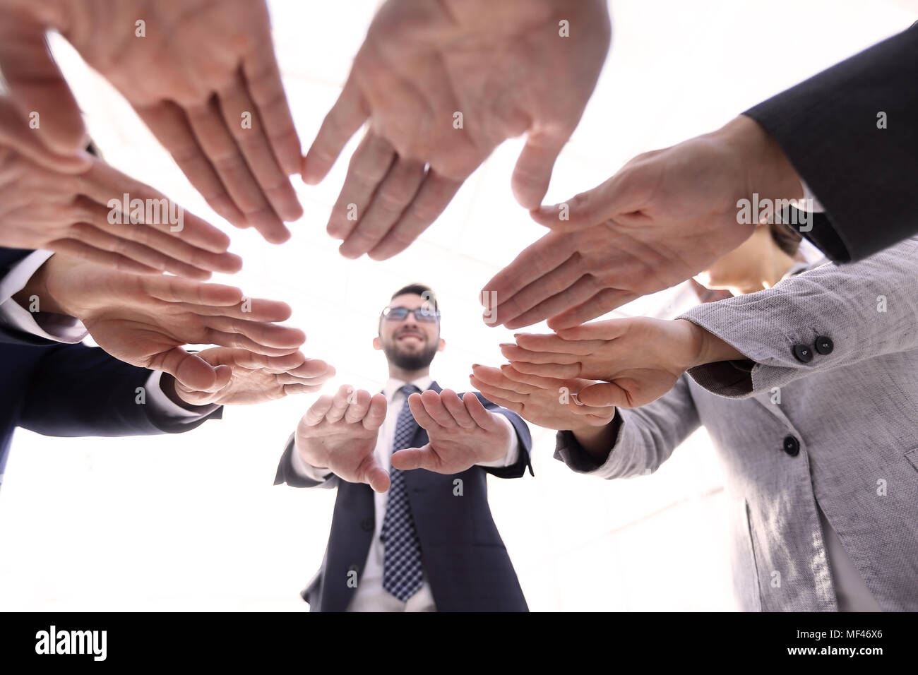 business team showing their unity Stock Photo - Alamy