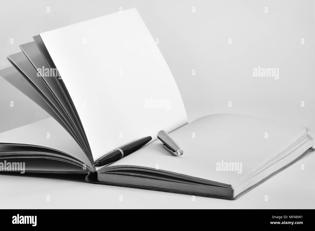 Old open vintage notebook Black and White Stock Photos & Images - Alamy