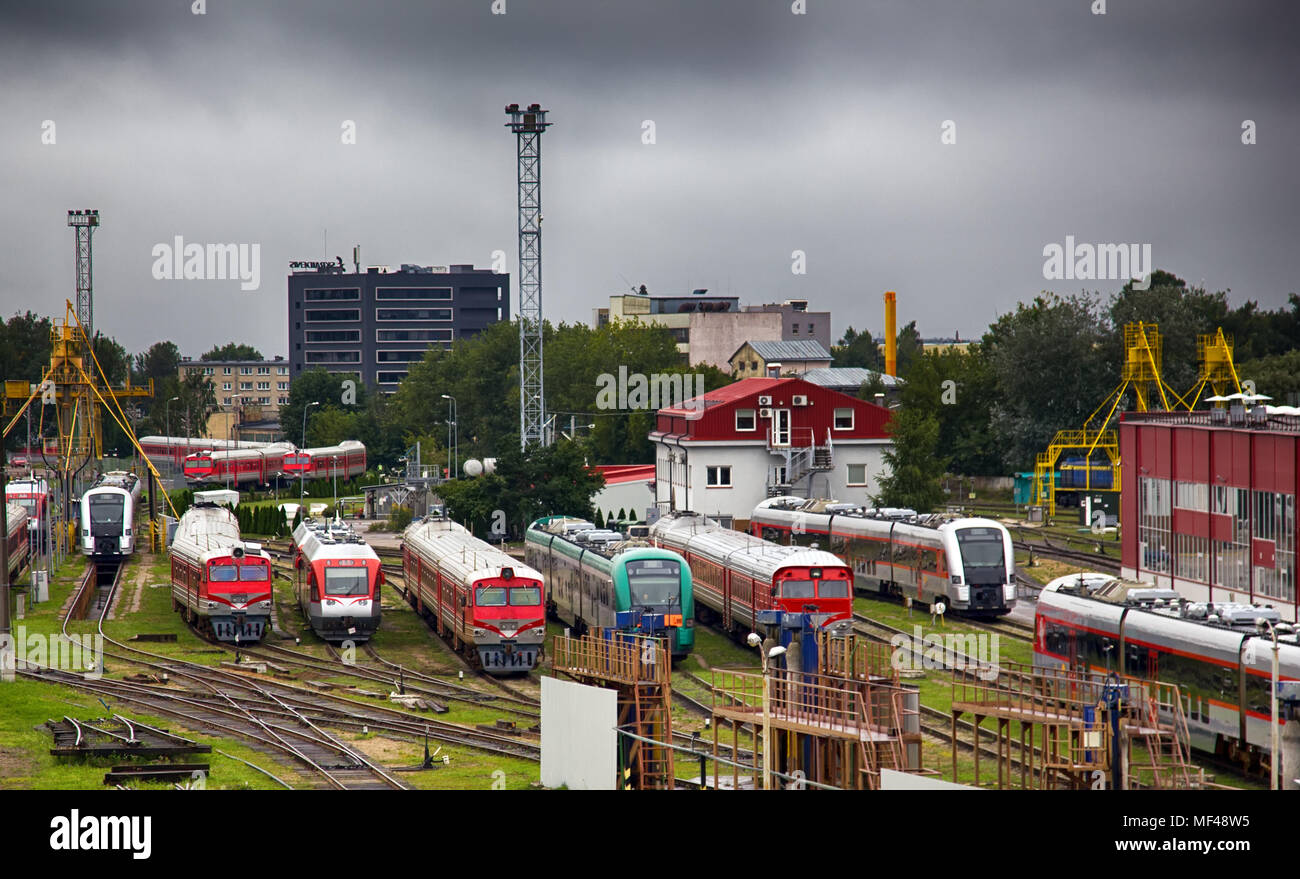European train depot in the city. passenger trains waiting for ...