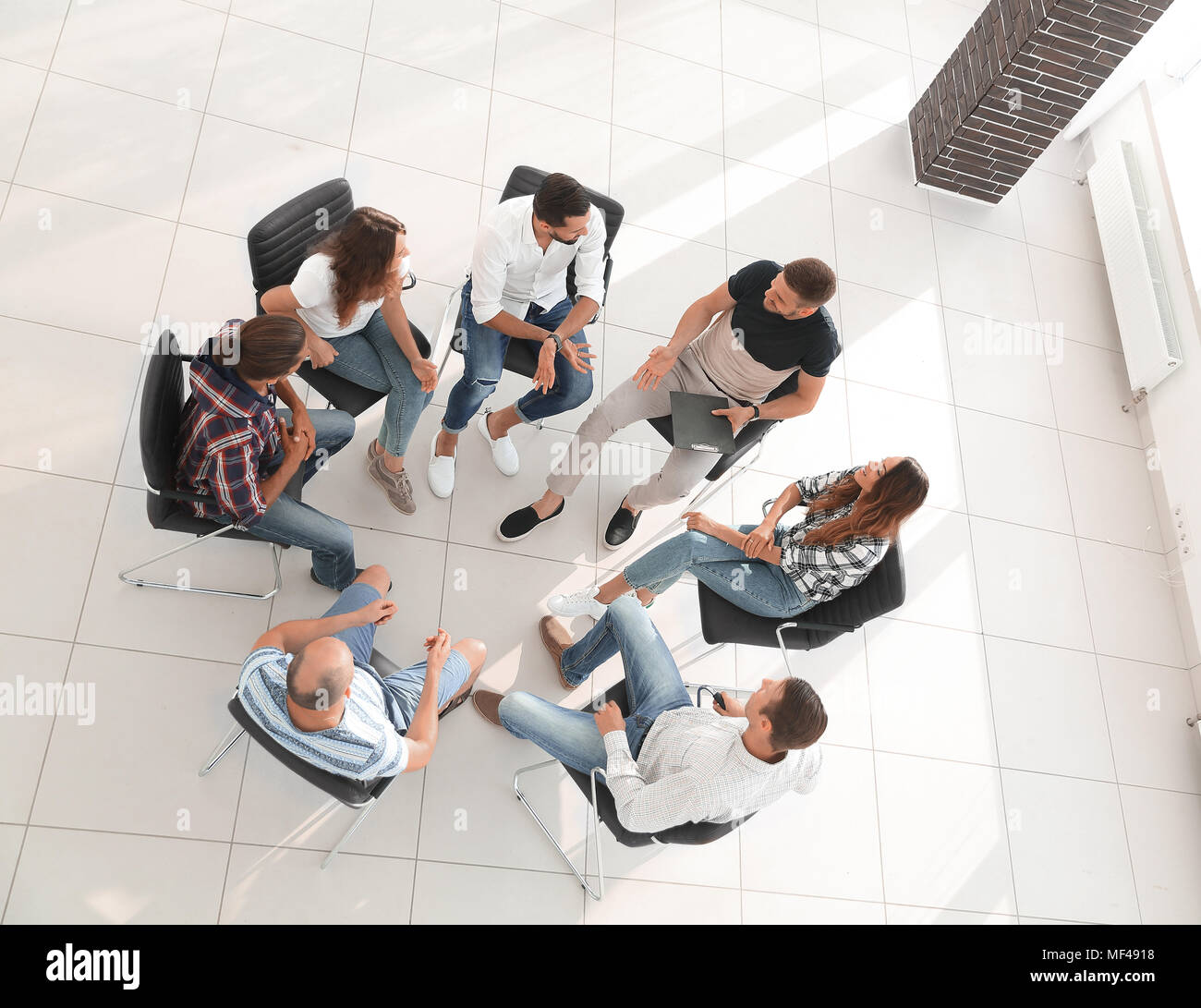 creative team sitting in class for team building Stock Photo - Alamy