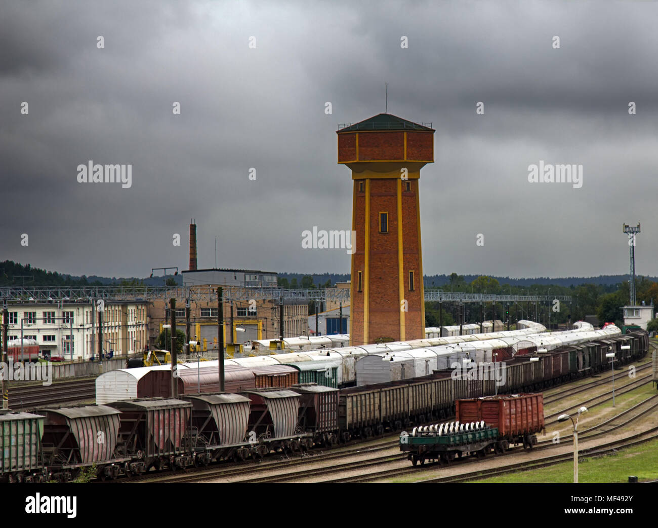 European train depot in the city. passenger trains waiting for ...