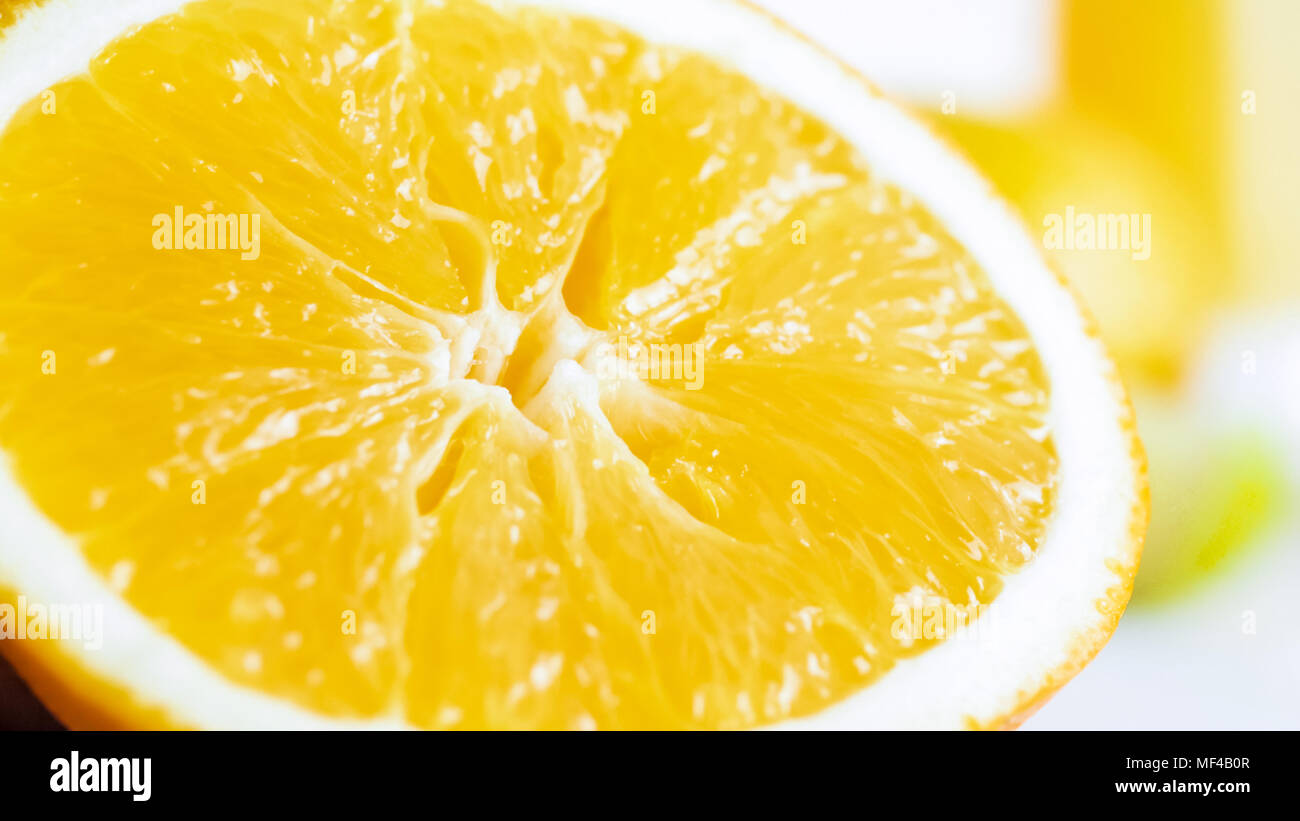 Closeup image of juicy orange pulp over white background Stock Photo ...