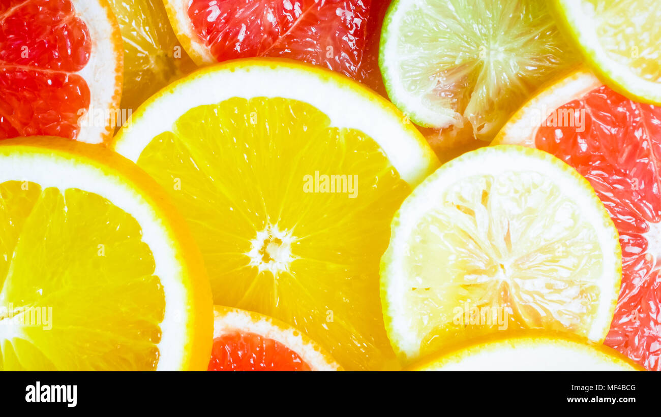 View from above of freshly cut citrus fruit slices Stock Photo - Alamy