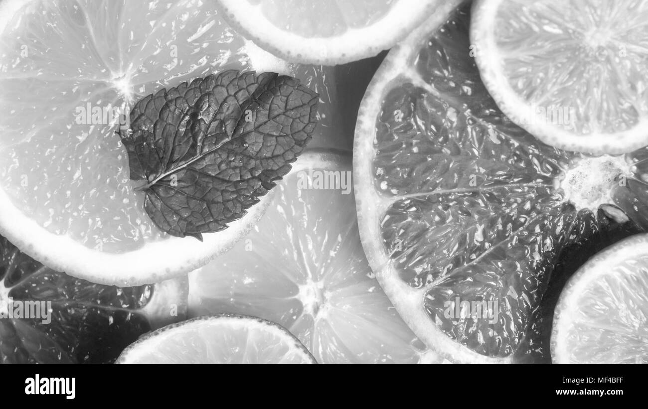 Red juicy cut lemon Black and White Stock Photos & Images - Alamy