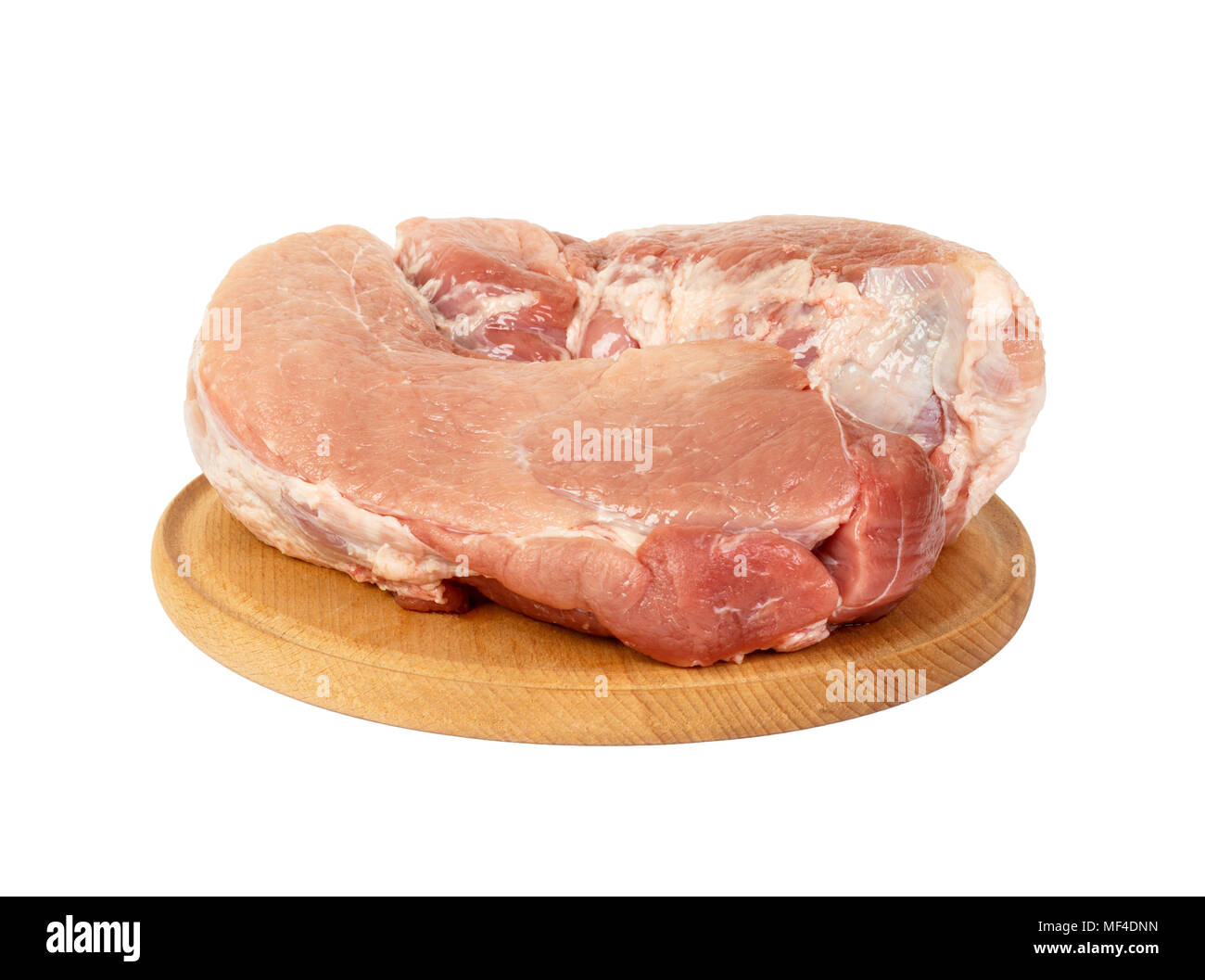 fresh pork meat on the round board isolated over white background Stock ...