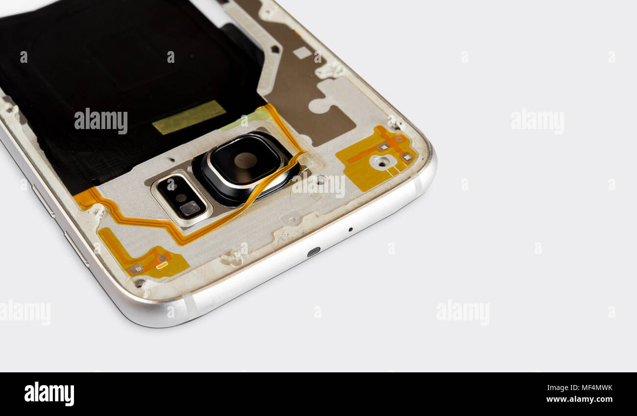 Broken cell phone with small screwdriver on white background Stock ...