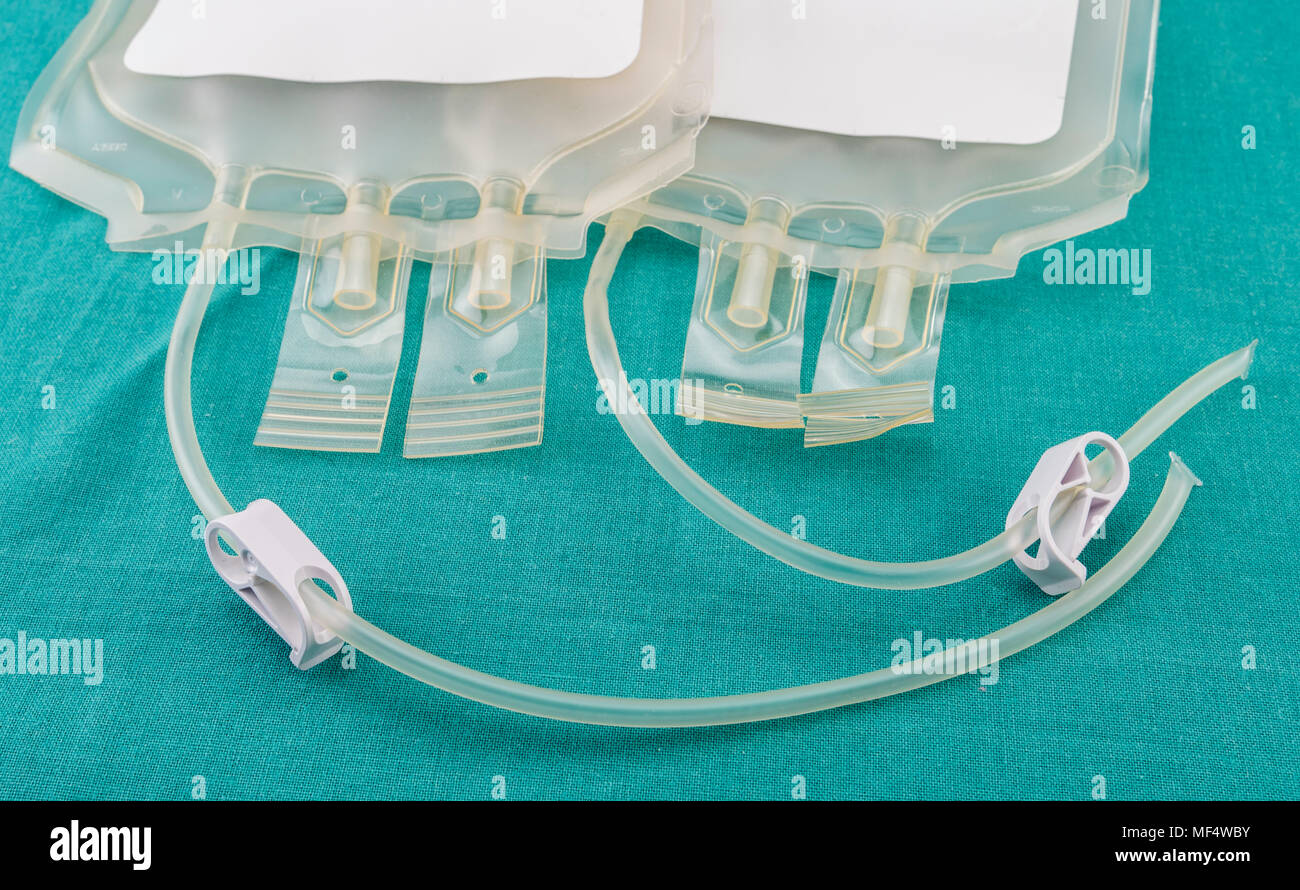 Empty blood bags at a hospital table, conceptual image Stock Photo - Alamy