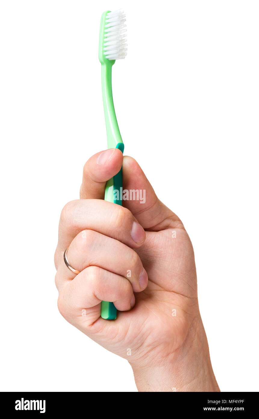Hand with toothbrush on white Stock Photo - Alamy