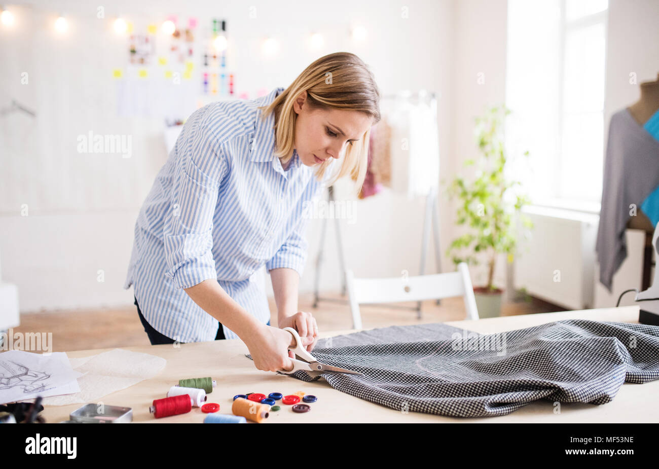 Young creative woman in a studio, startup business Stock Photo - Alamy
