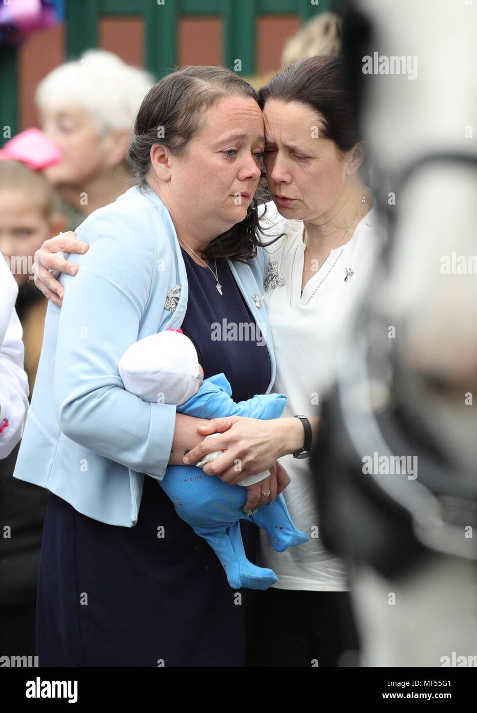 Mylee Billingham's mother Tracey Taundry holds a doll as she arrives at ...