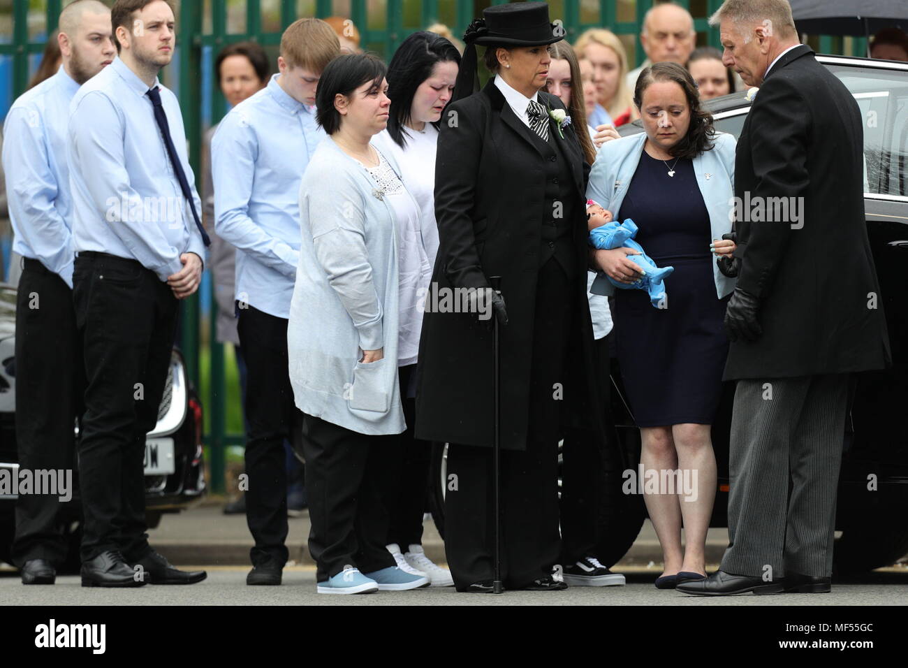 Mylee Billingham's mother Tracey Taundry holds a doll as she arrives at ...