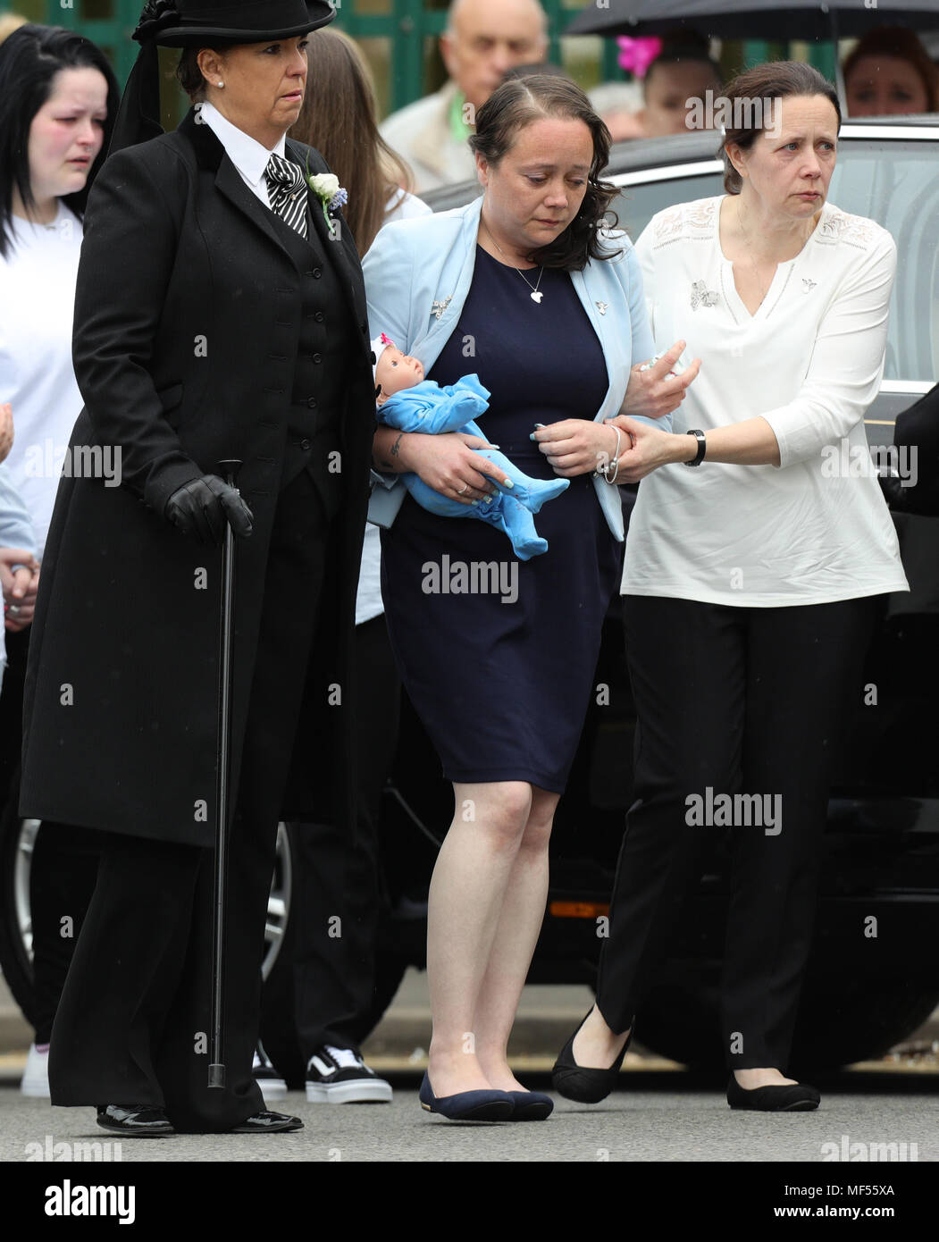 Mylee Billingham's mother Tracey Taundry holds a doll as she arrives at ...