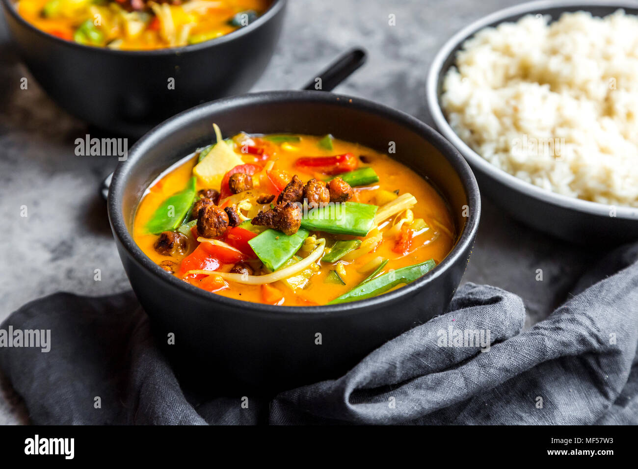 Red curry in bowls, rice Stock Photo - Alamy