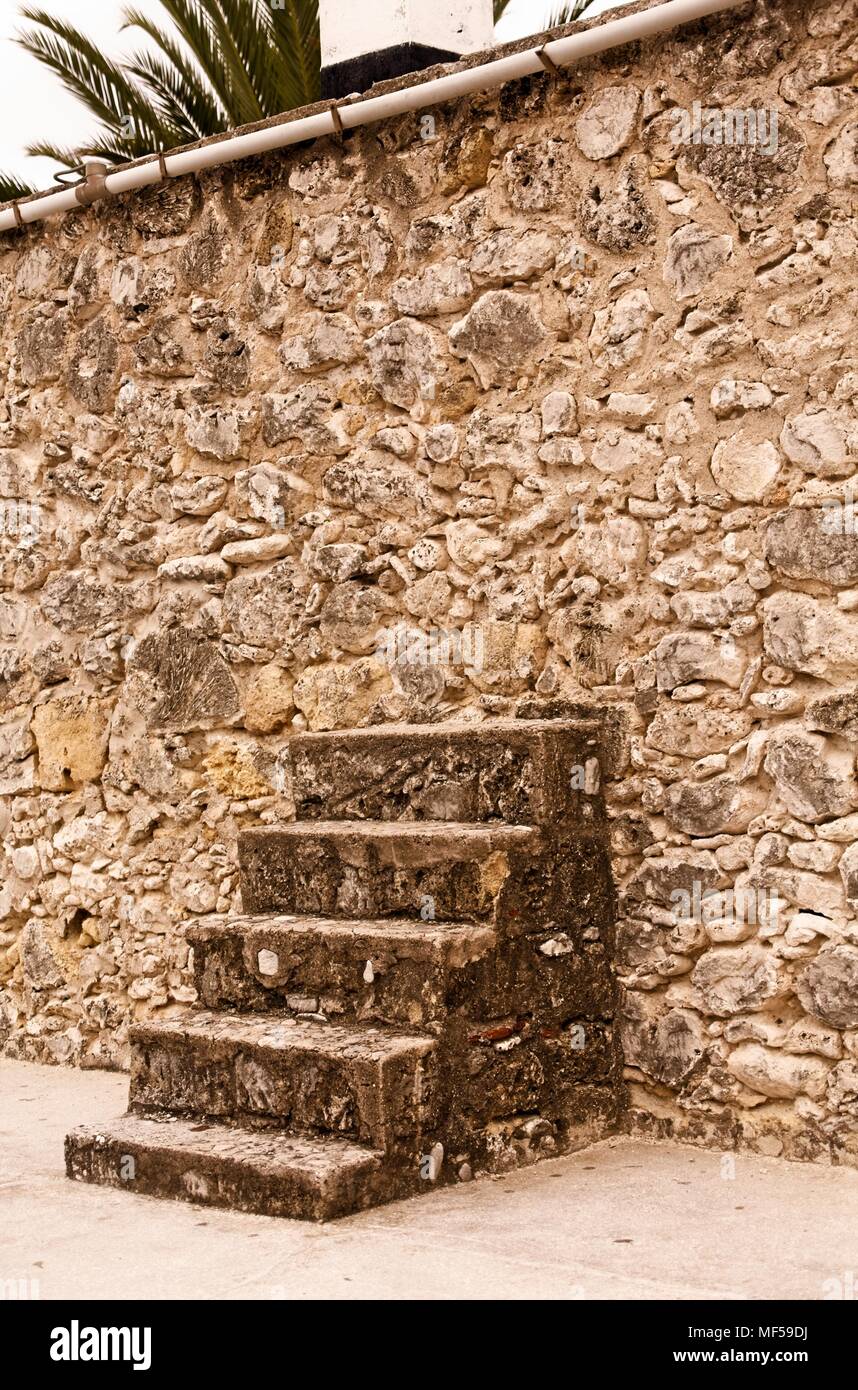 Old Stone Steps to Nowhere on a Wall in Curacao Stock Photo - Alamy