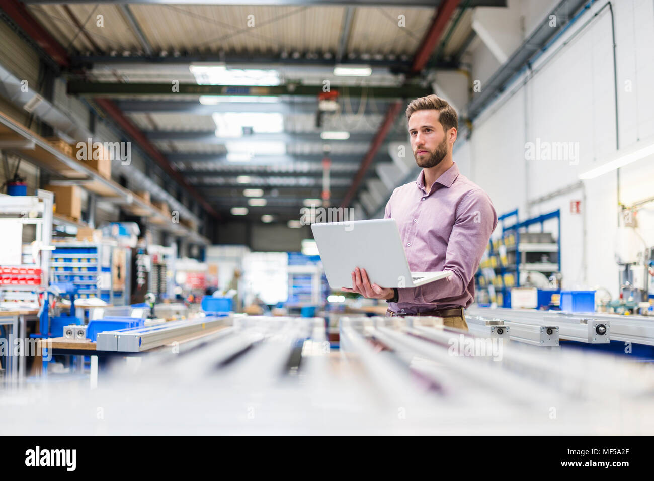 Laptop production hi-res stock photography and images - Alamy