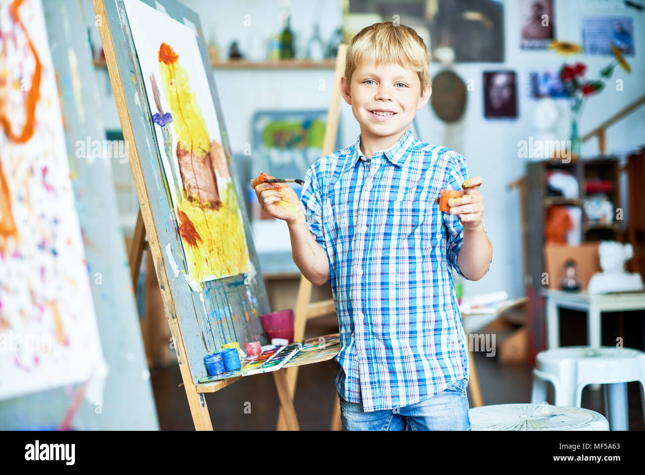 Happy Little Boy Enjoying Art Class Stock Photo - Alamy