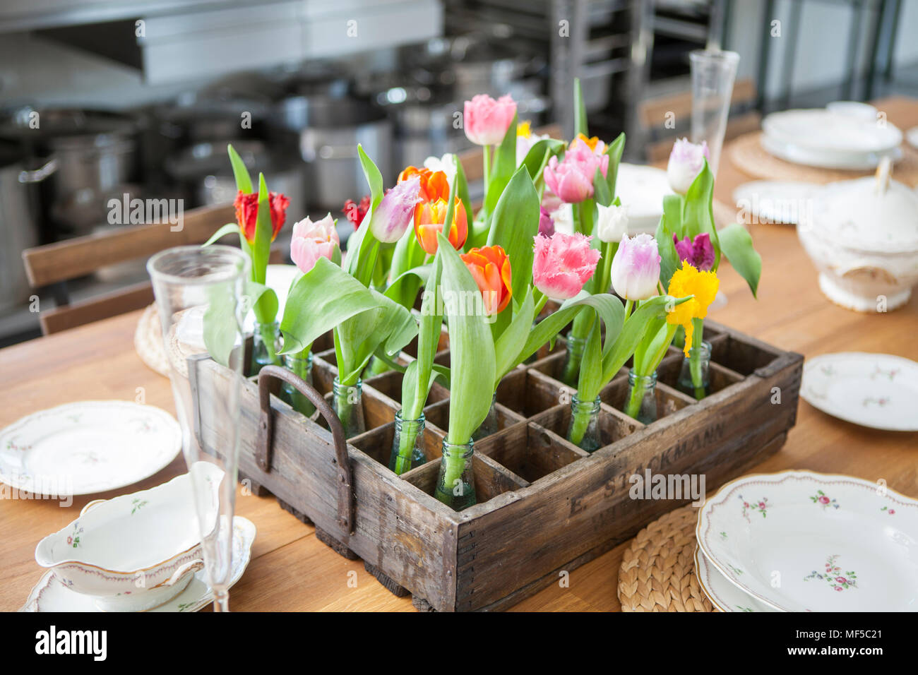 Table decoration with tulips Stock Photo - Alamy