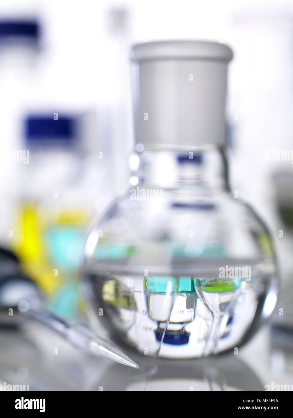 Pipette and laboratory glassware Stock Photo - Alamy