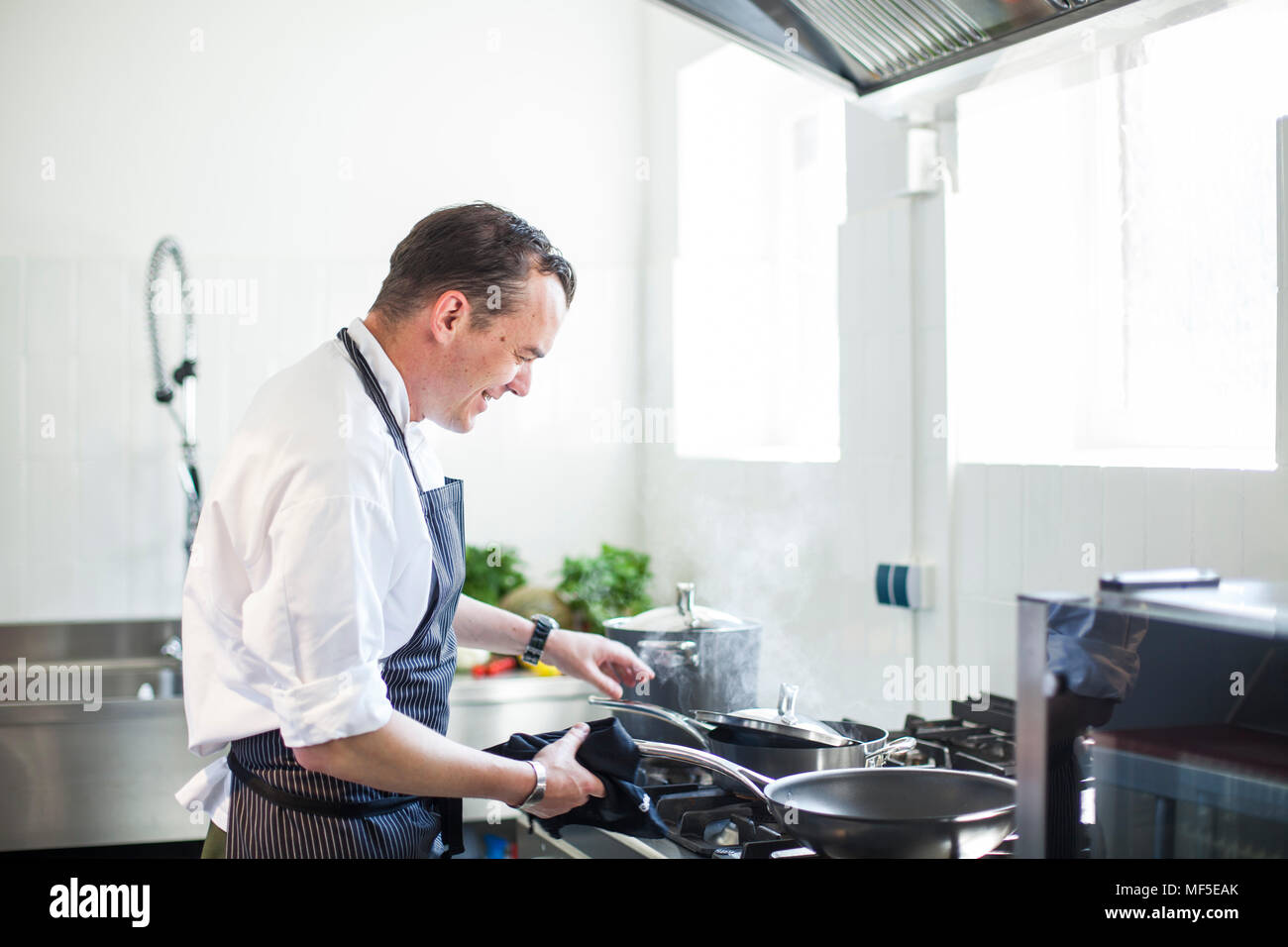 Preparing to cook hi-res stock photography and images - Alamy