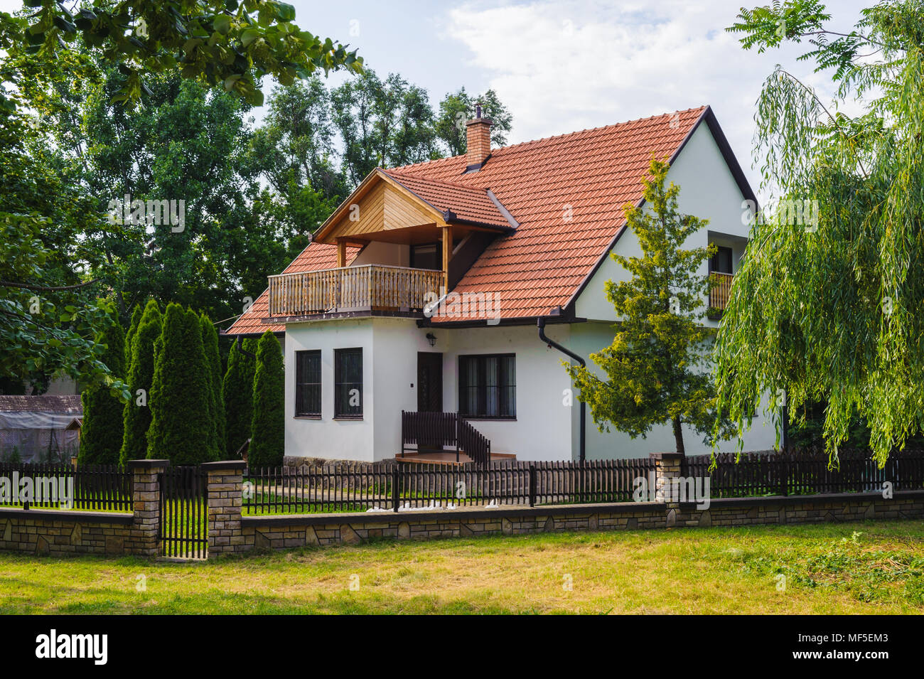 Living house among the trees Stock Photo - Alamy