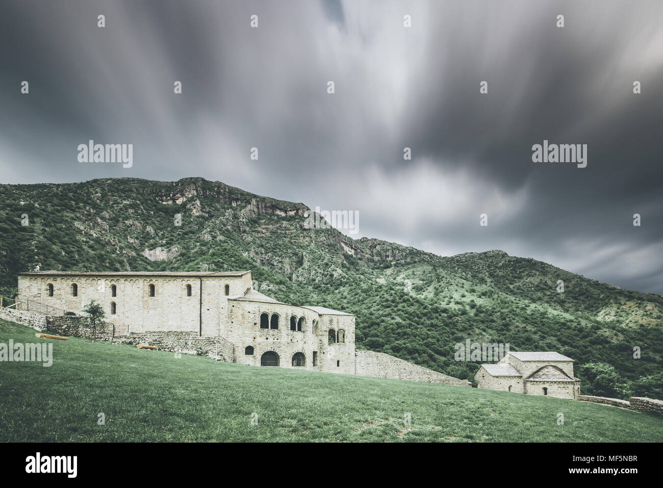 church in mountain landscape - spring mood - desaturated style image ...