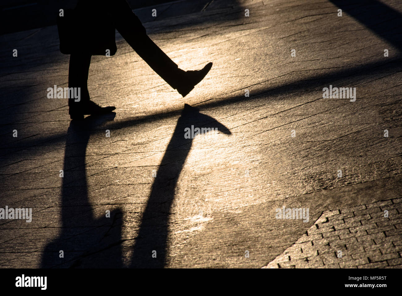 Shadows people walking city street crossing hi-res stock photography ...