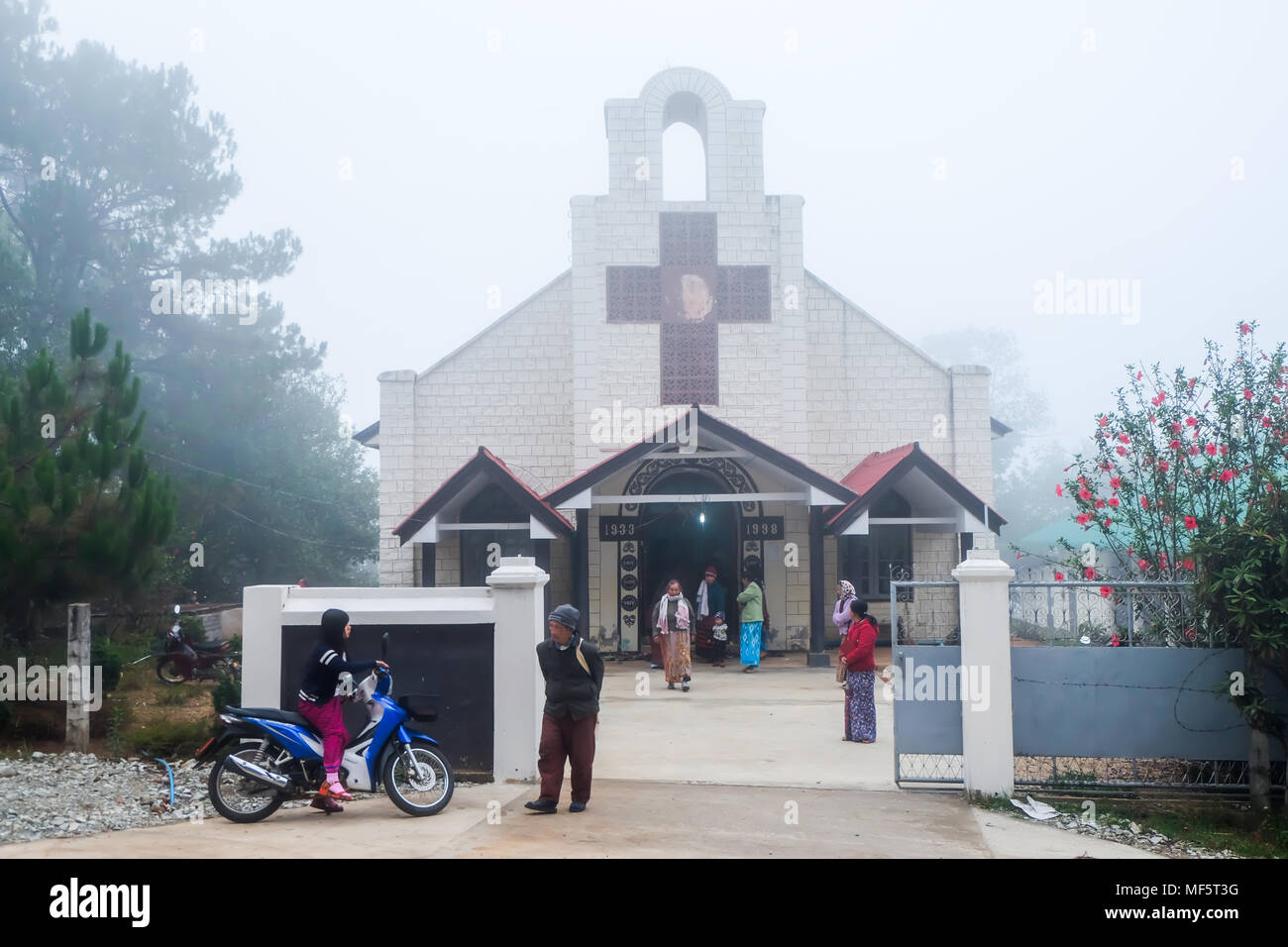 April 2 2017 - Loimwe, Shan State, Myanmar. Churchgoers leaving church ...