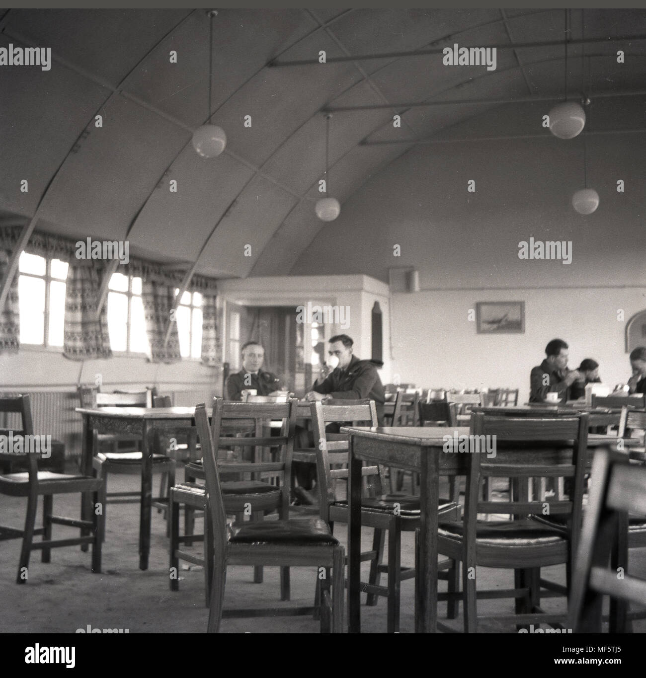 1940s, historical, two RAF personal having a cup of tea in an armed ...