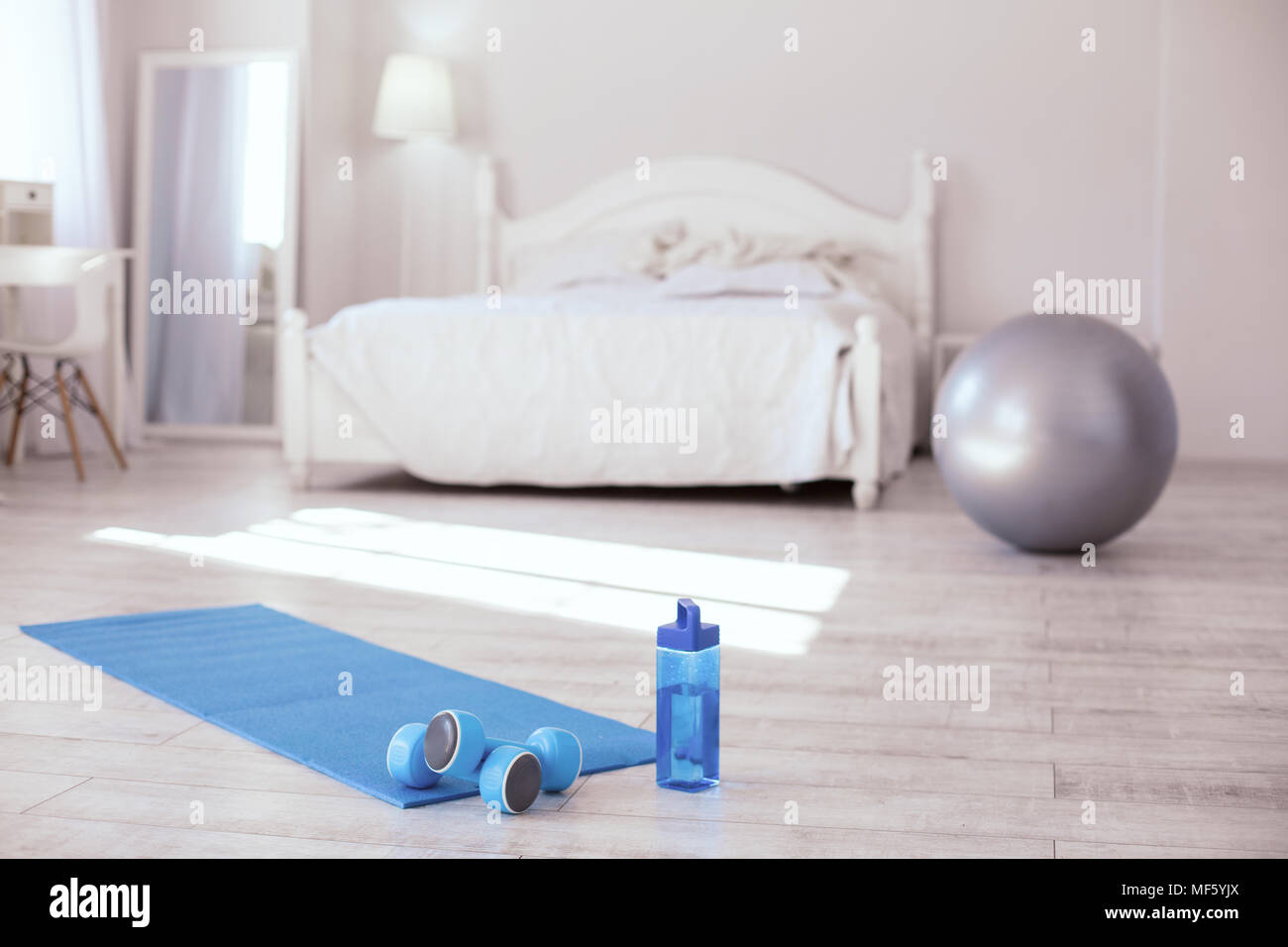 Blue exercise equipment ready to use Stock Photo - Alamy