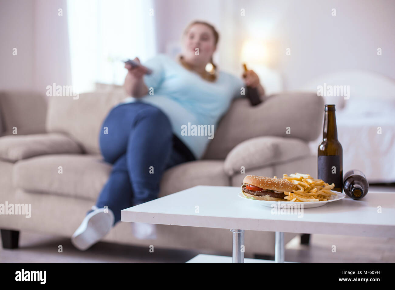 Greasy food waiting on the table next to the beer Stock Photo - Alamy