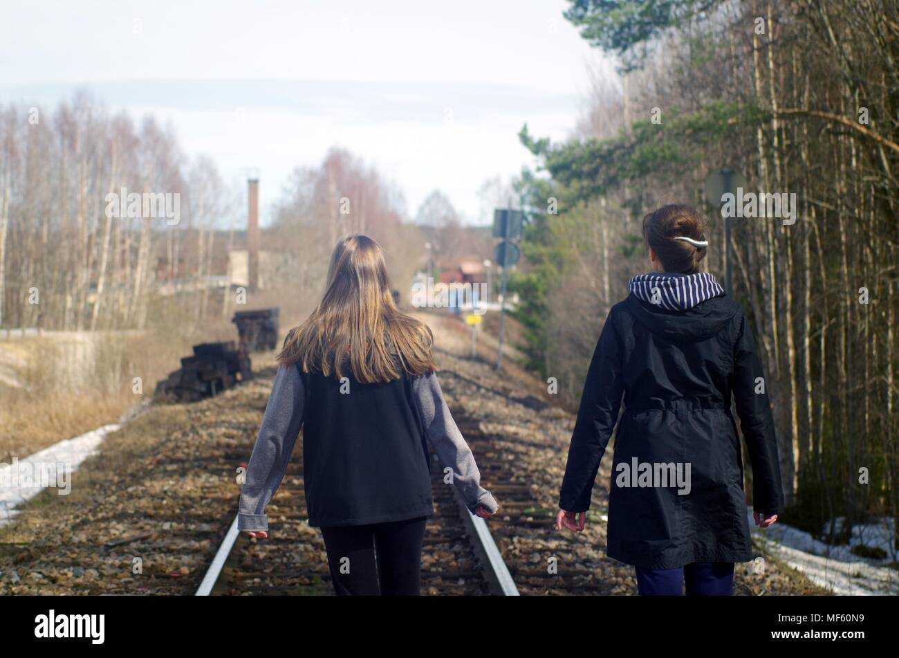 walking on train tracks Stock Photo - Alamy