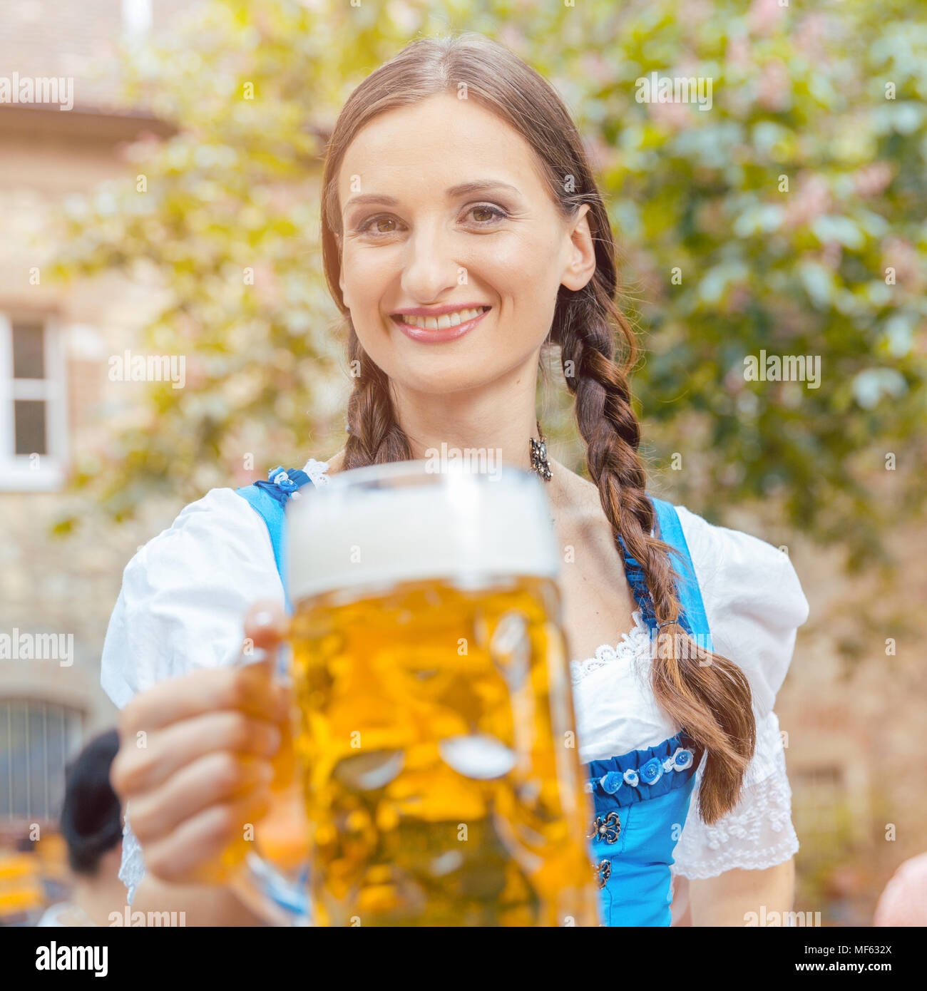 Woman wearing dirndl at the oktoberfest hi-res stock photography and ...