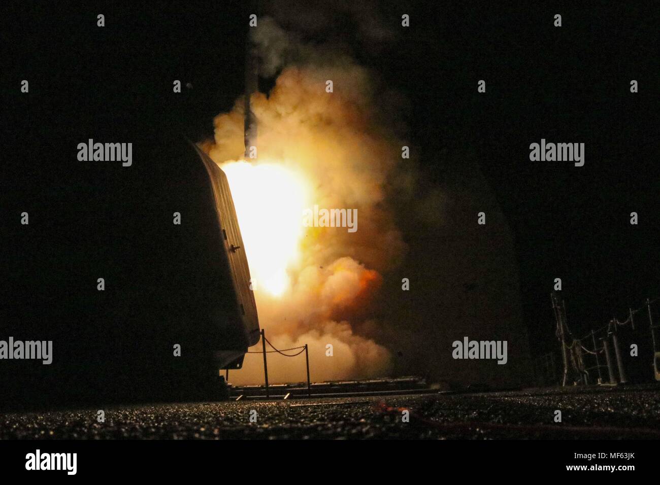 The guided-missile cruiser USS Monterey (CG 61) fires a Tomahawk land ...