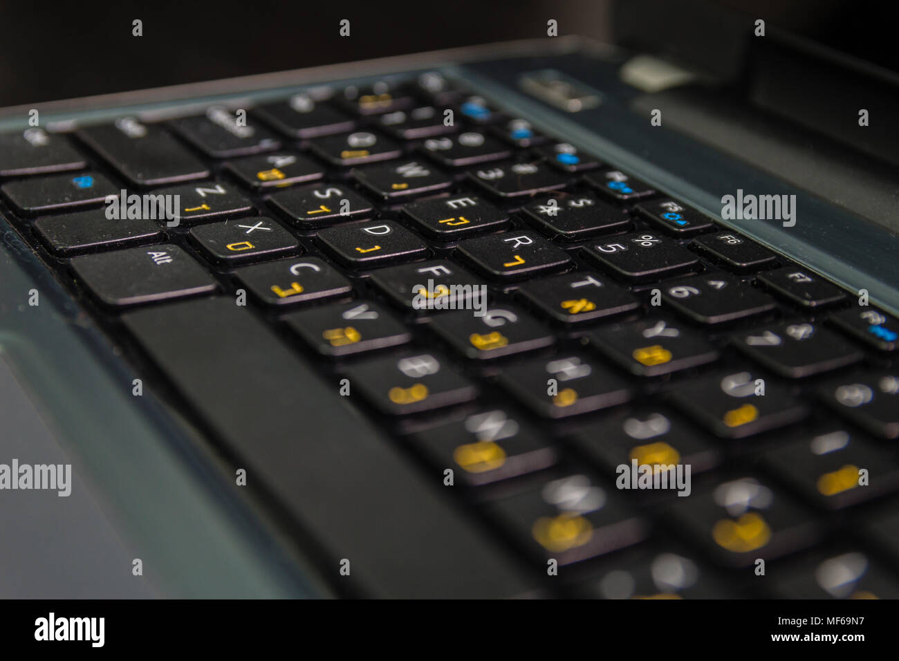 Keyboard with letters in Hebrew and English - Laptop keyboard - Close ...