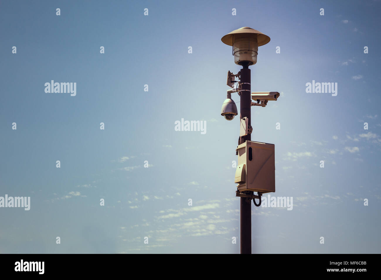 Surveillance cameras on street lamp Stock Photo - Alamy