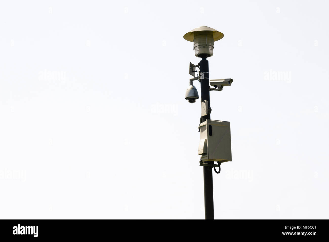 Surveillance cameras on street lamp. Isolated on white background Stock ...