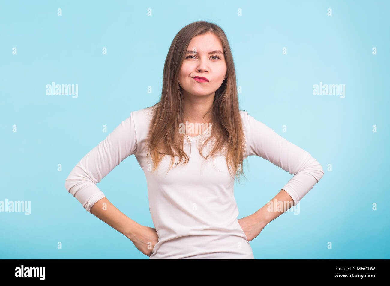 Pissed off angry grumpy young pessimistic woman with bad attitude ...