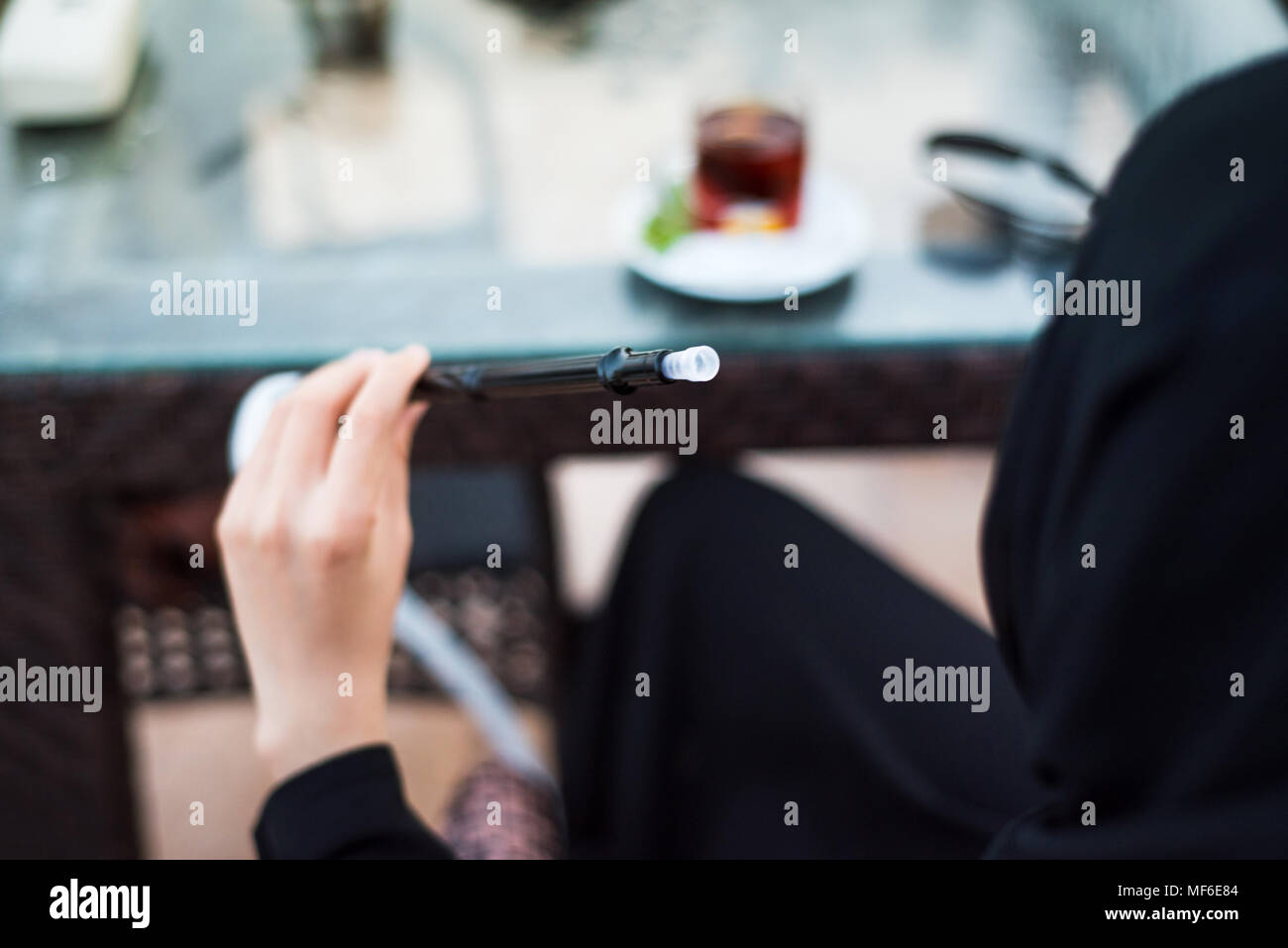 Muslim smoking cigarette hi-res stock photography and images - Alamy